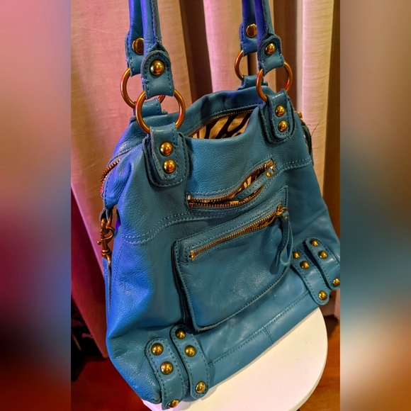 Linea Pelle | Bags | Linea Pelle Turquoise Leather Purse With Zebra ...